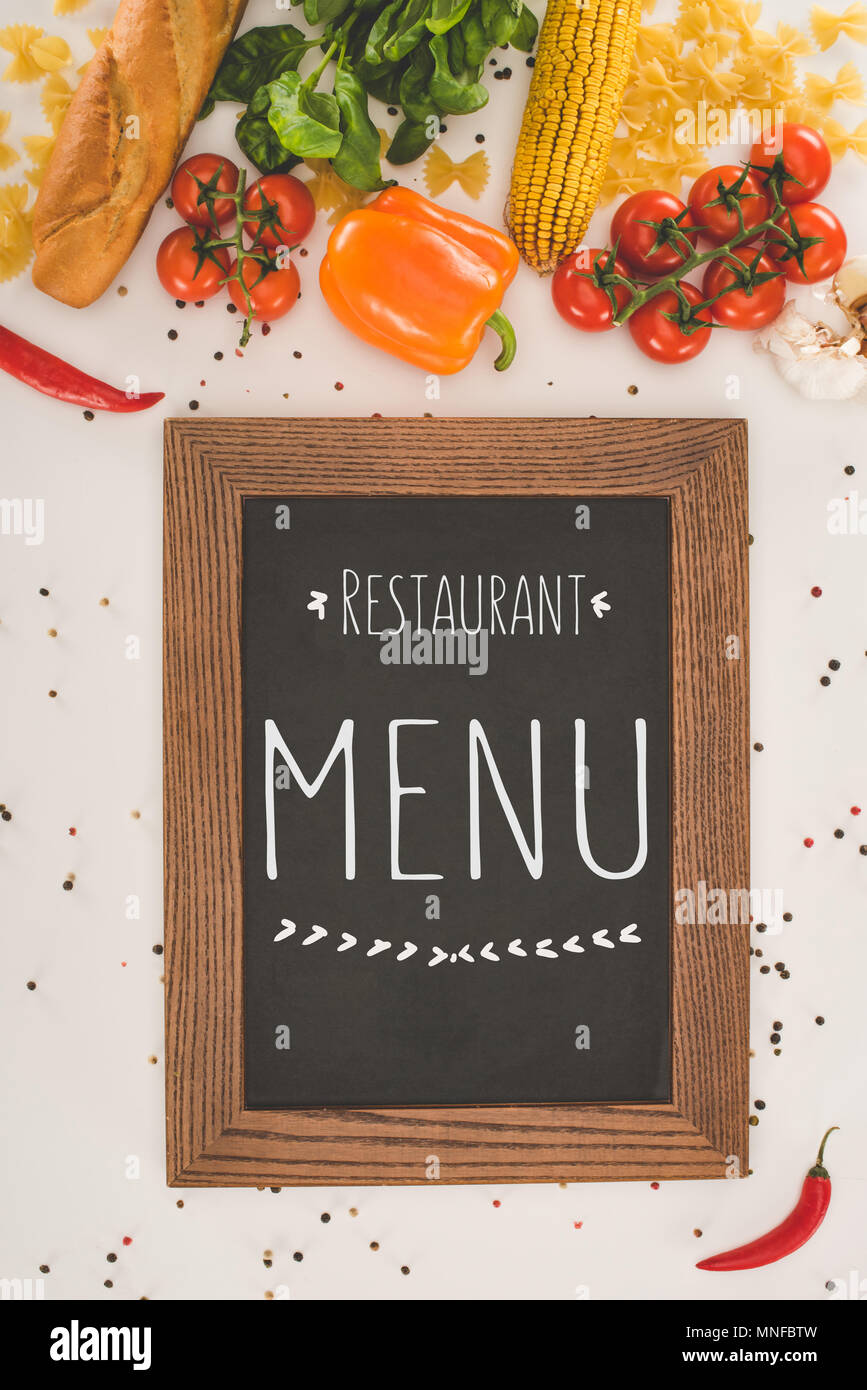 restaurant menu and fresh vegetables Stock Photo - Alamy