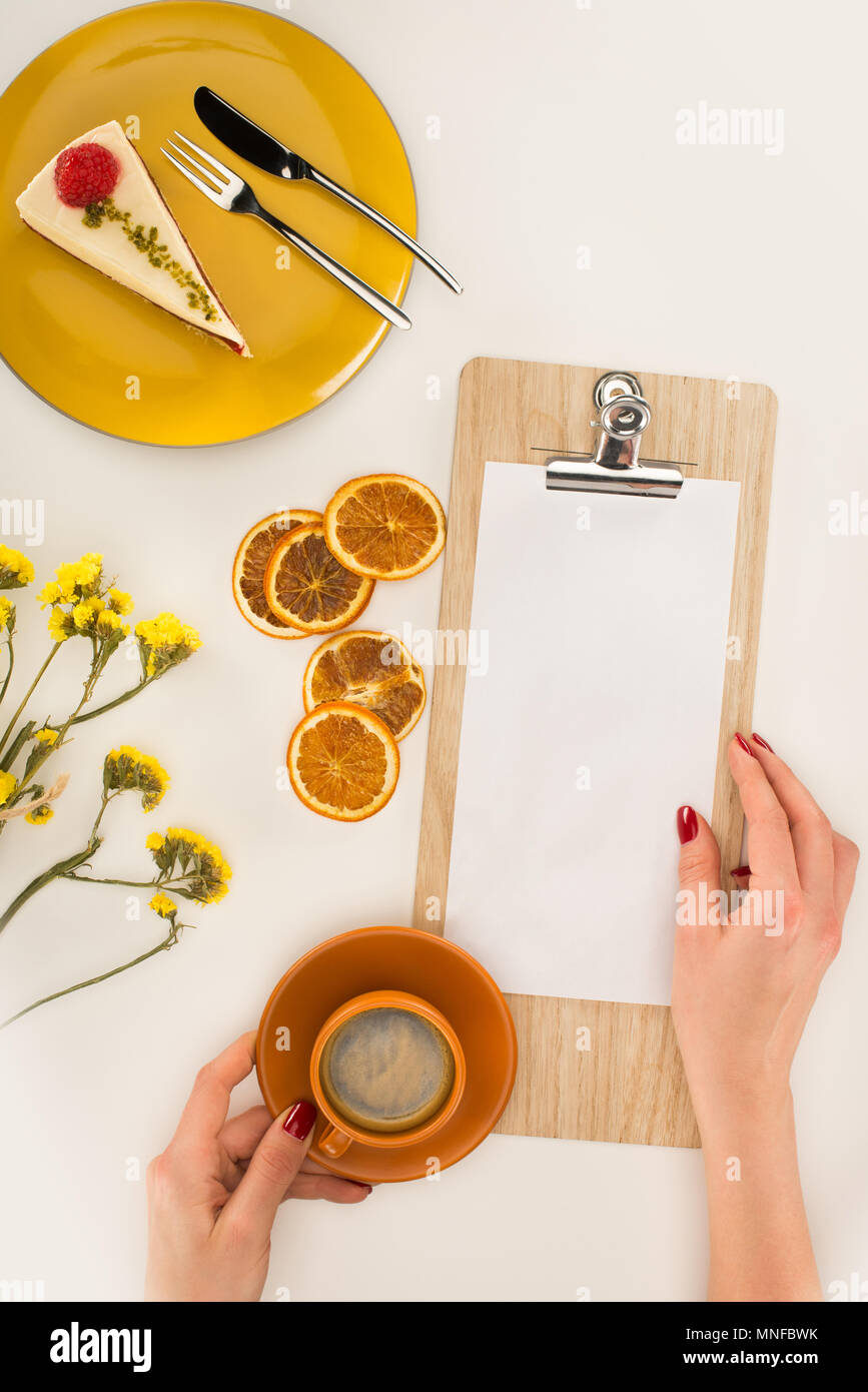 Hands holding menu hi-res stock photography and images - Alamy