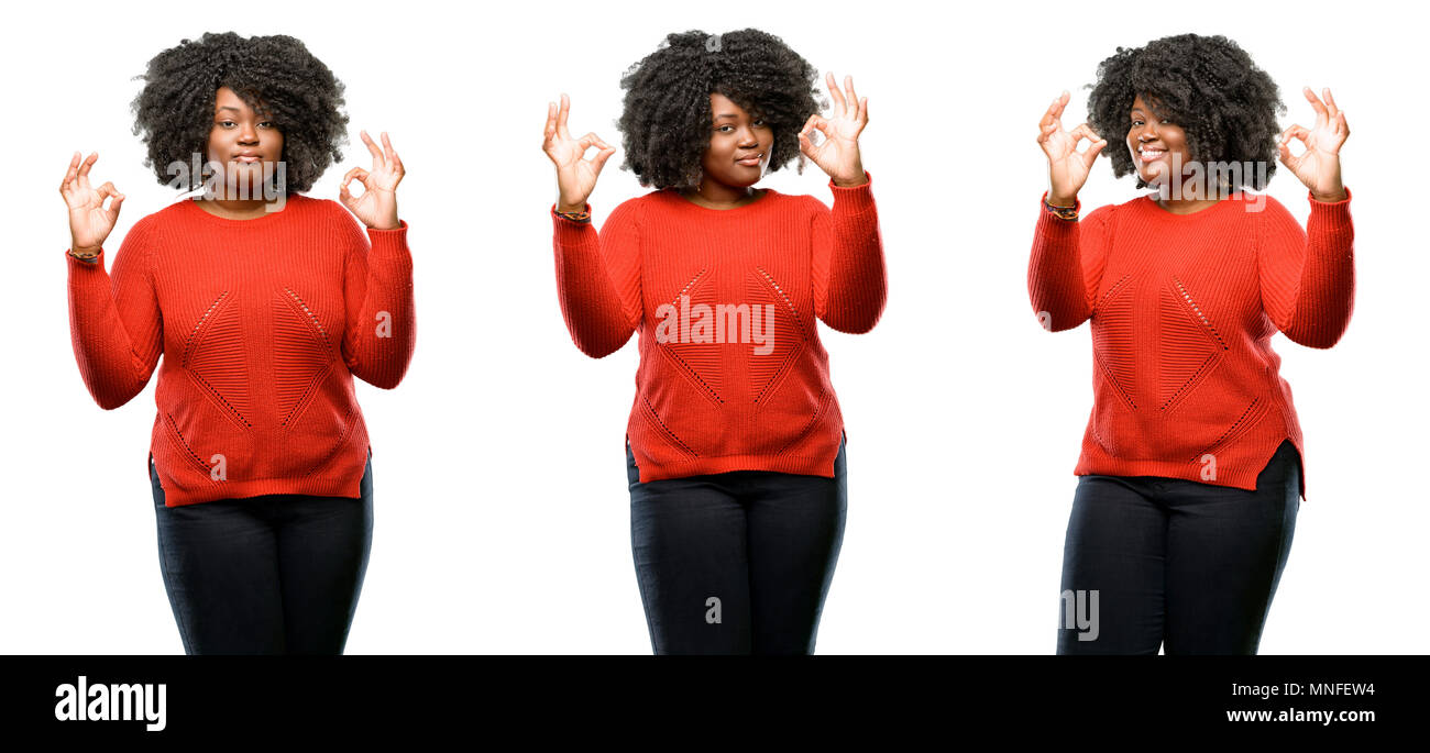 Young beautiful african plus size model doing ok sign gesture with both ...
