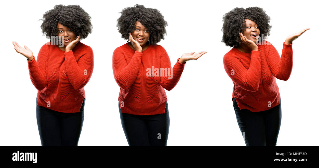 Young beautiful african plus size model holding something in his empty ...