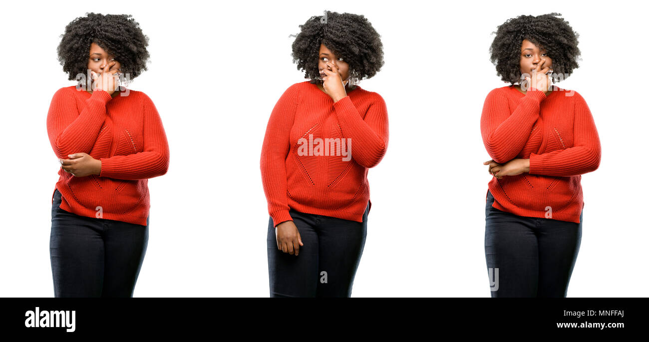 Young beautiful african plus size model scared in shock, expressing ...