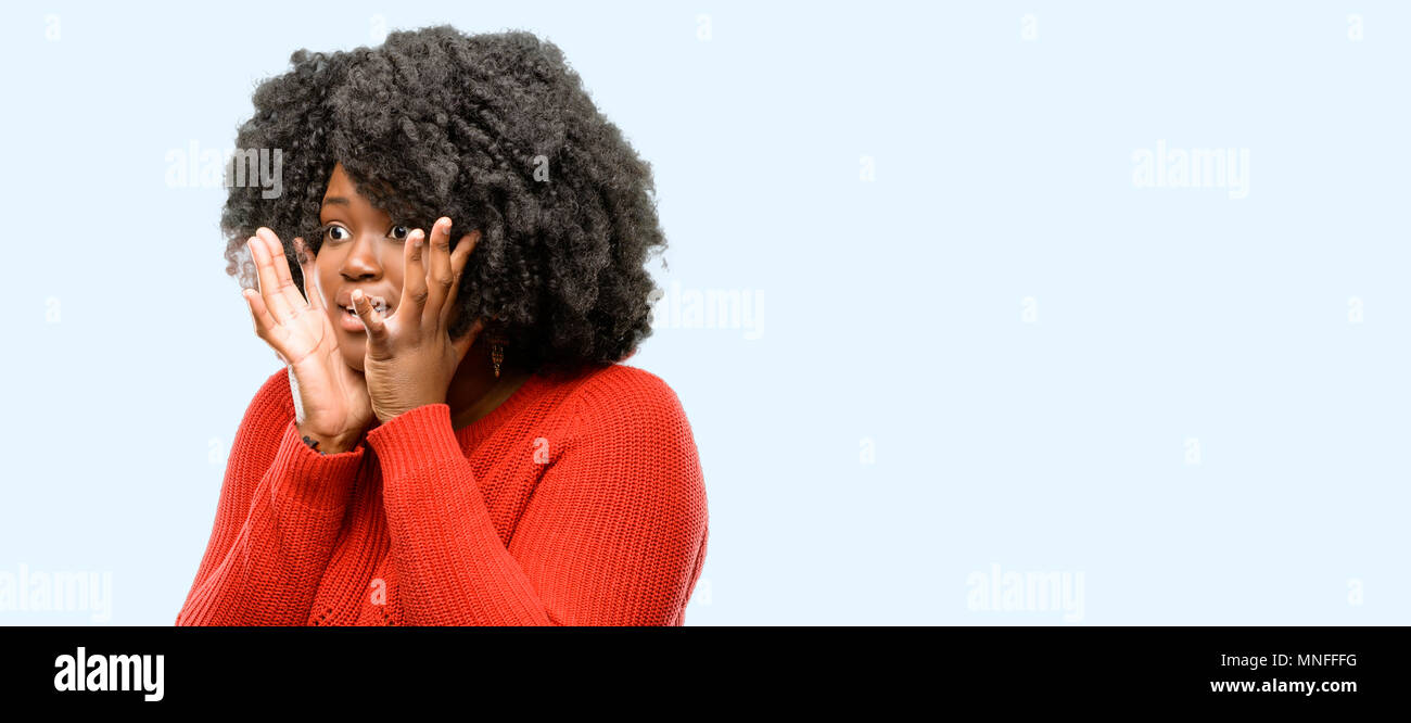 Beautiful african woman stressful keeping hands on head, terrified in ...