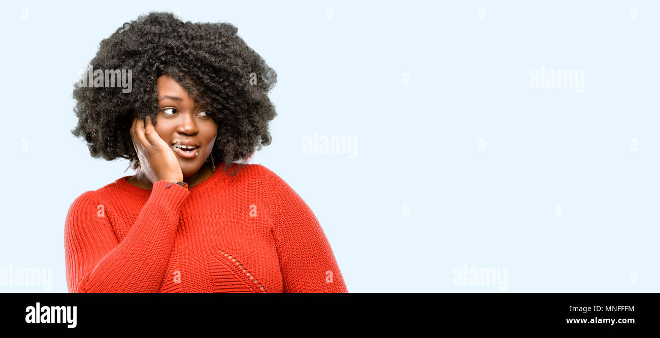 Beautiful african woman so happy and confident showing a big smile ...