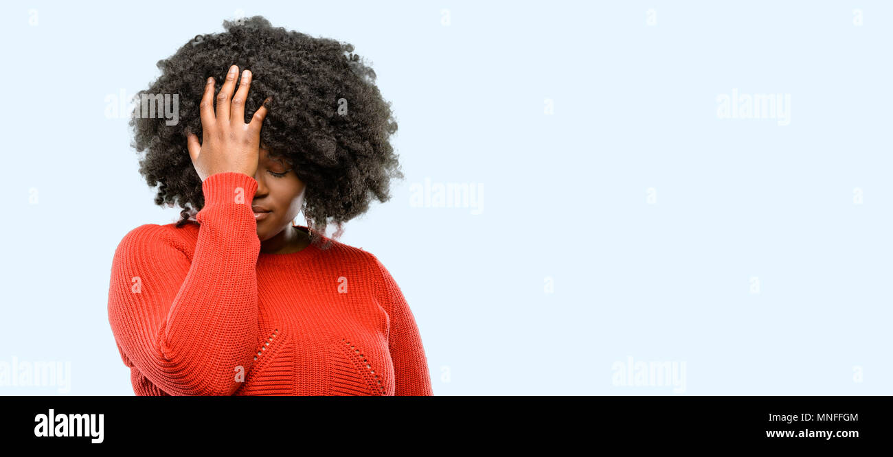 Beautiful african woman stressful keeping hand on head, tired and ...