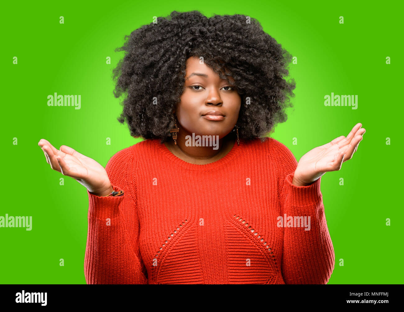 Beautiful african woman doubt expression, confuse and wonder concept ...