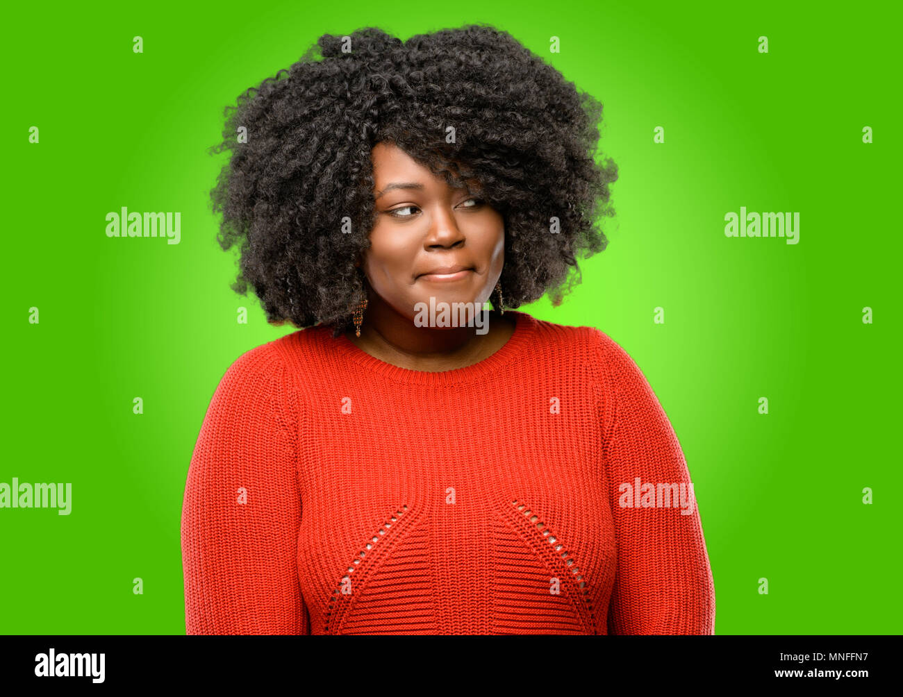 Beautiful african woman doubt expression, confuse and wonder concept ...