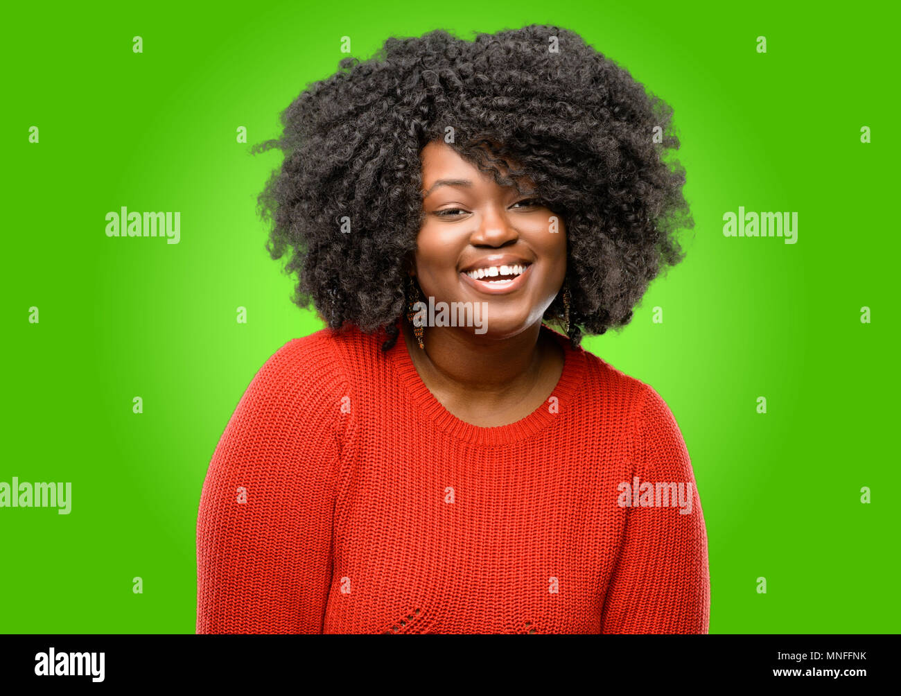 Beautiful african woman confident and happy with a big natural smile ...