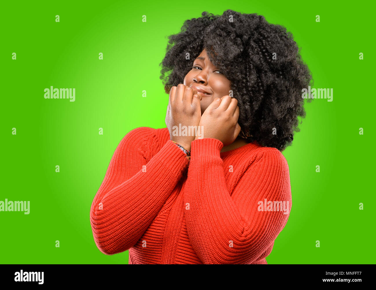 Beautiful african woman terrified and nervous expressing anxiety and ...
