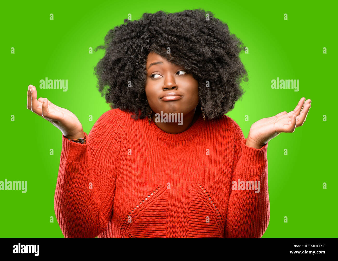 Beautiful african woman doubt expression, confuse and wonder concept ...