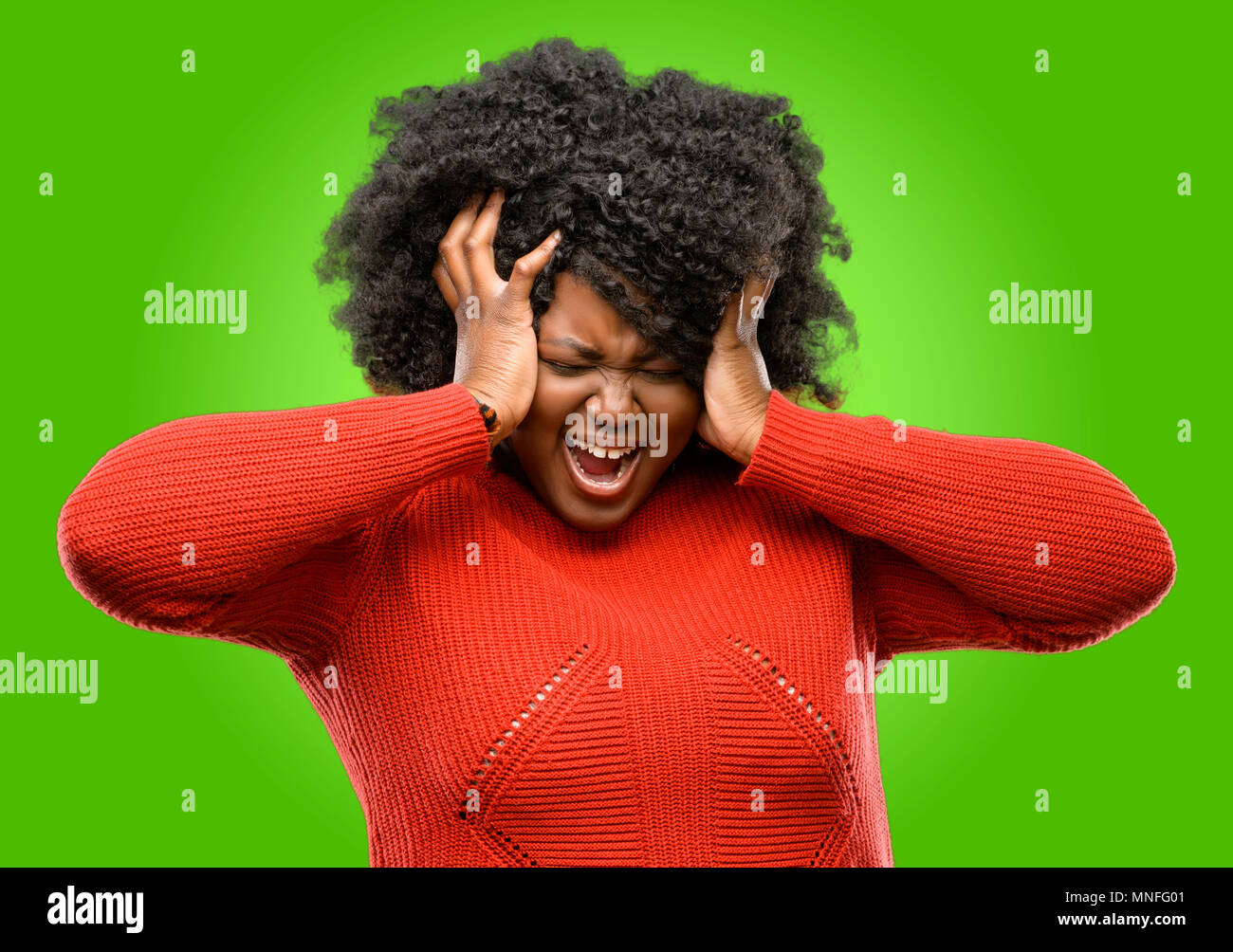 Beautiful african woman stressful keeping hands on head, terrified in ...
