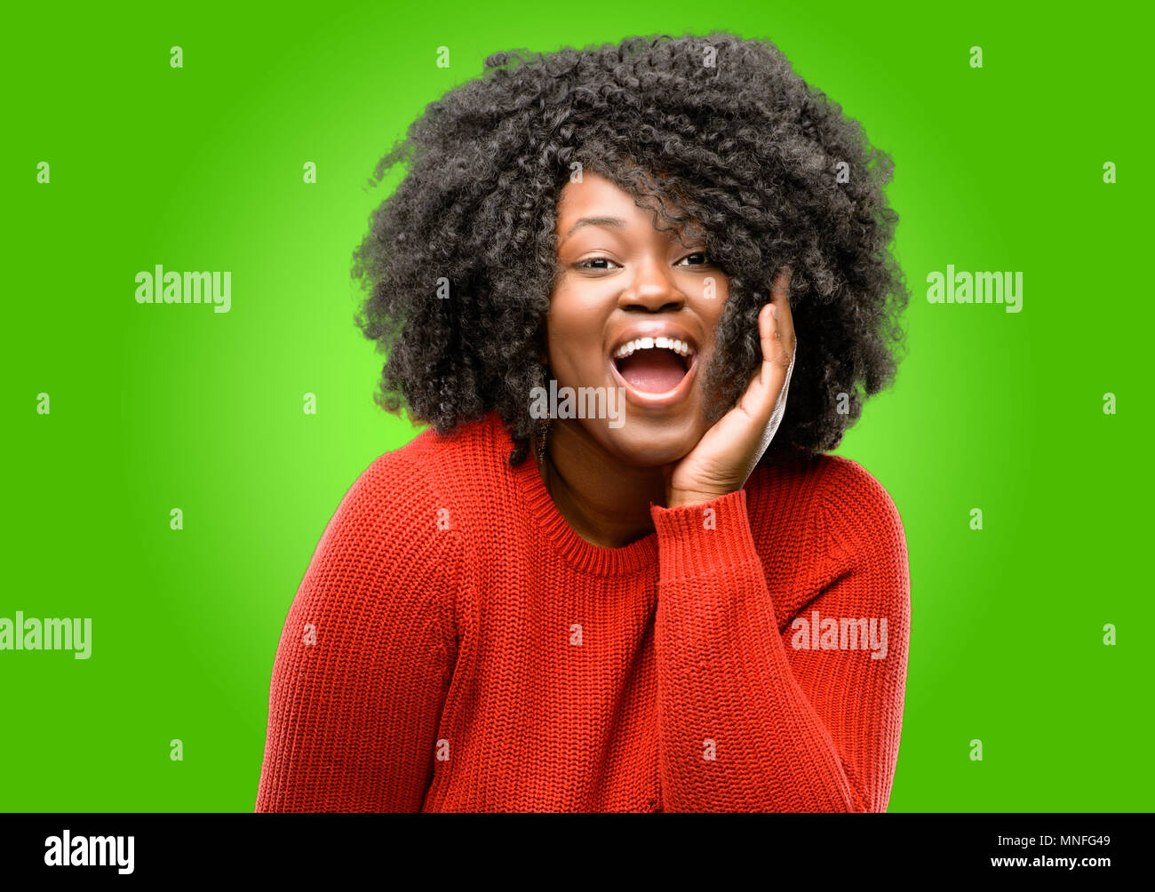 Beautiful african woman so happy and confident showing a big smile ...