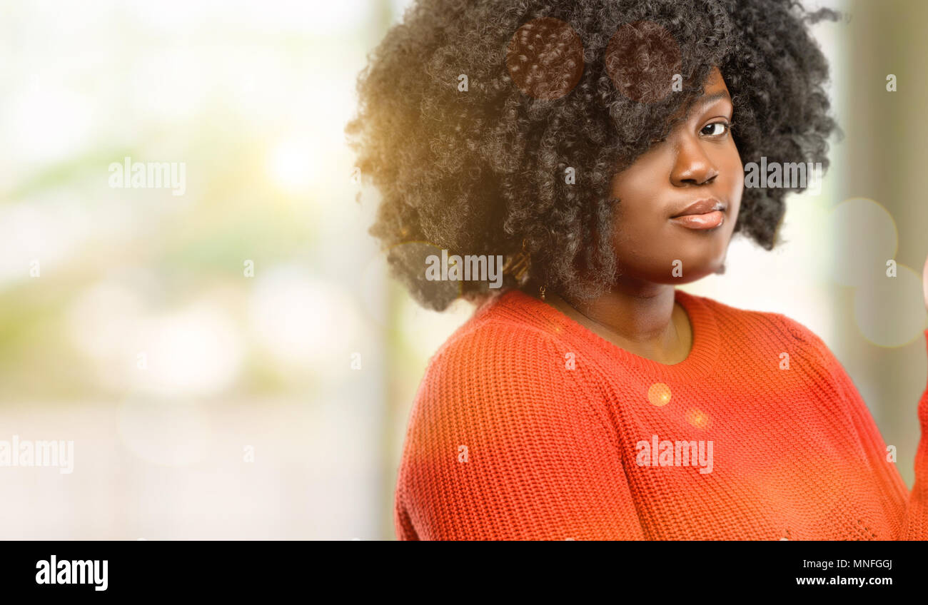 Black woman standing proud pose hi-res stock photography and images - Alamy
