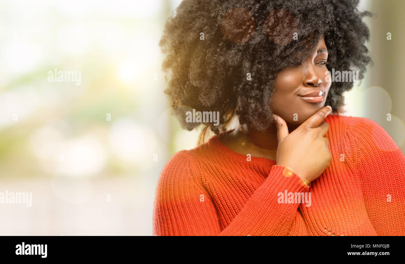 Beautiful african woman doubt expression, confuse and wonder concept ...