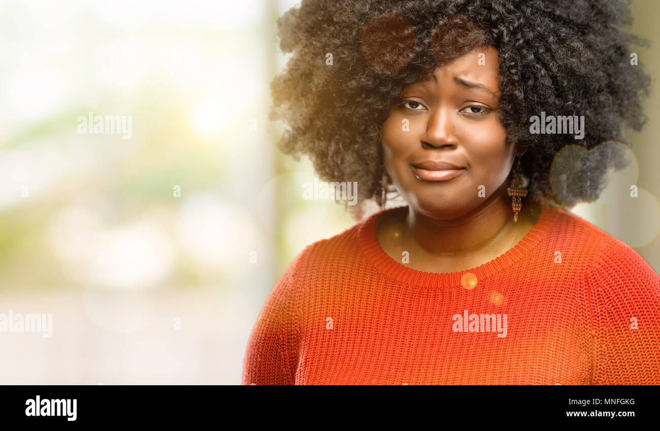 Beautiful african woman with sad and upset expression, unhappy, outdoor ...