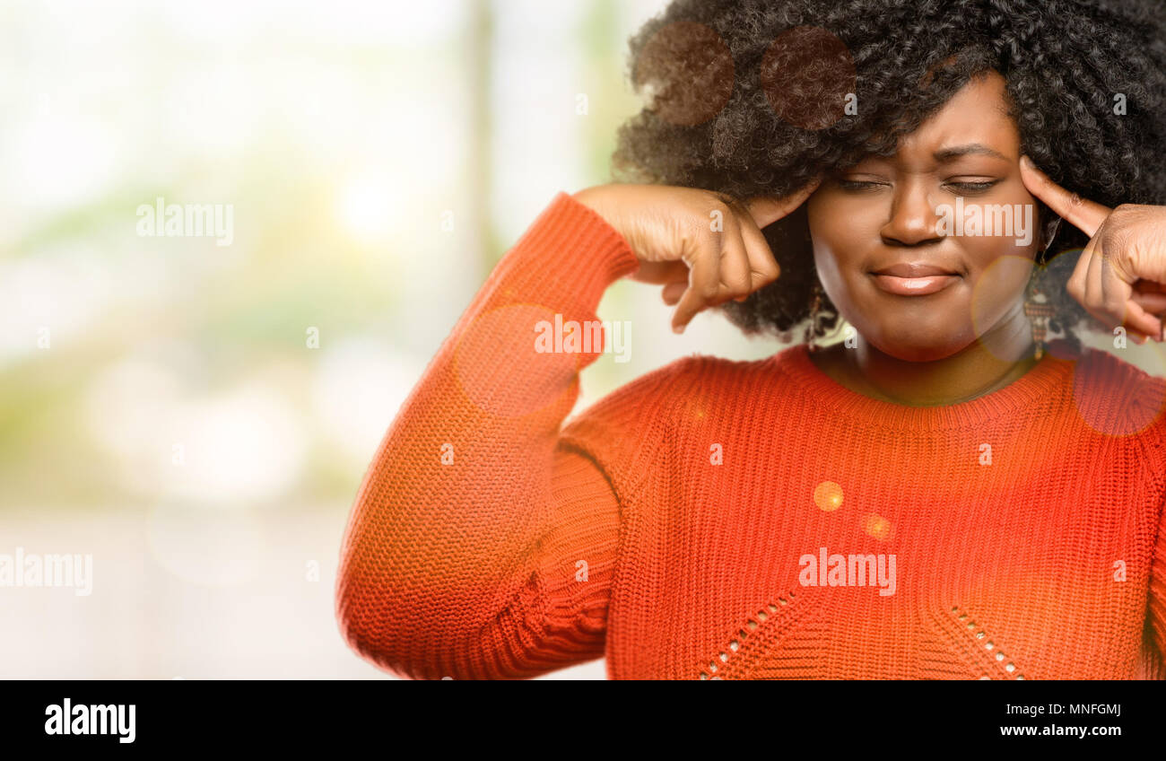 Beautiful african woman doubt expression, confuse and wonder concept ...