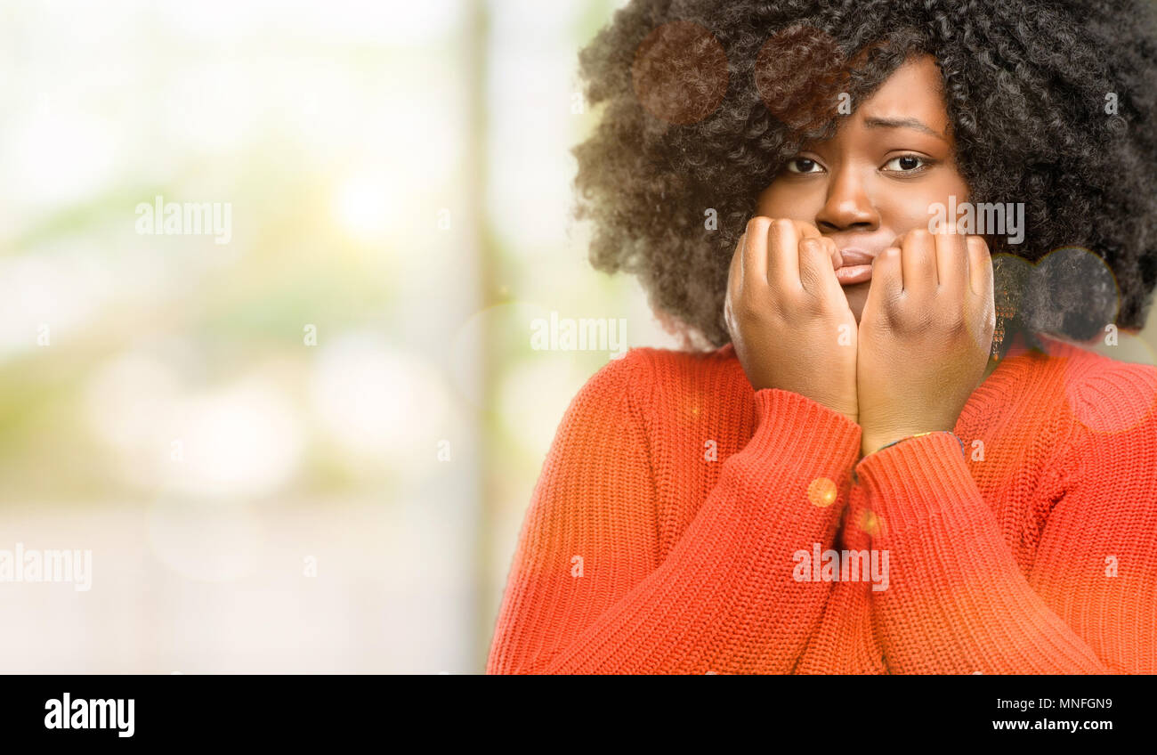 Beautiful african woman terrified and nervous expressing anxiety and ...