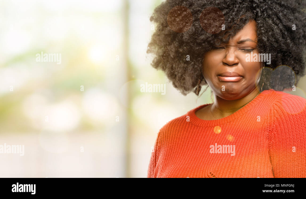 Beautiful african woman crying depressed full of sadness expressing sad ...