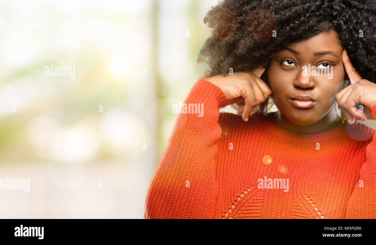 Beautiful african woman doubt expression, confuse and wonder concept ...