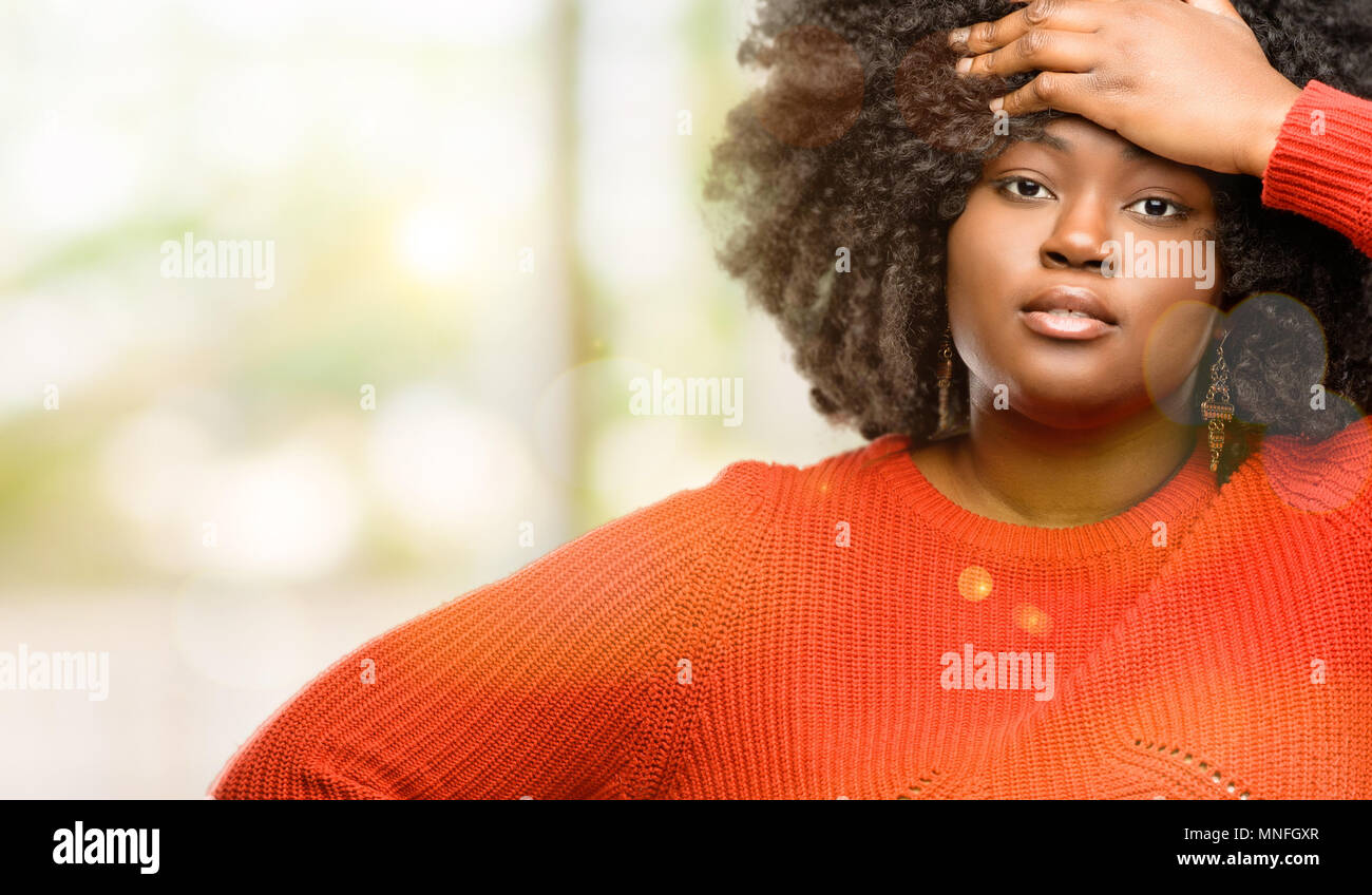 Beautiful african woman terrified and nervous expressing anxiety and ...