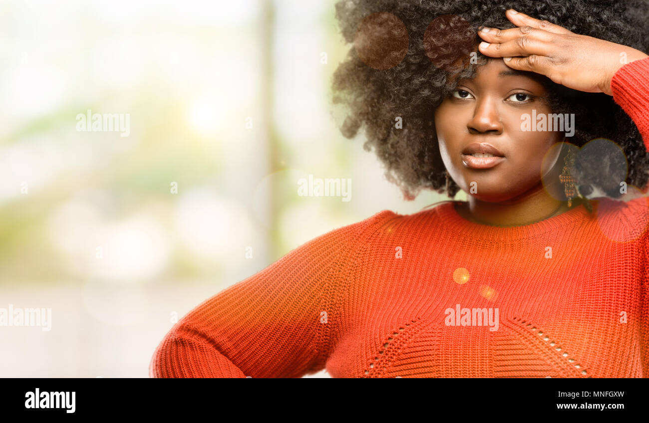 Beautiful african woman terrified and nervous expressing anxiety and ...
