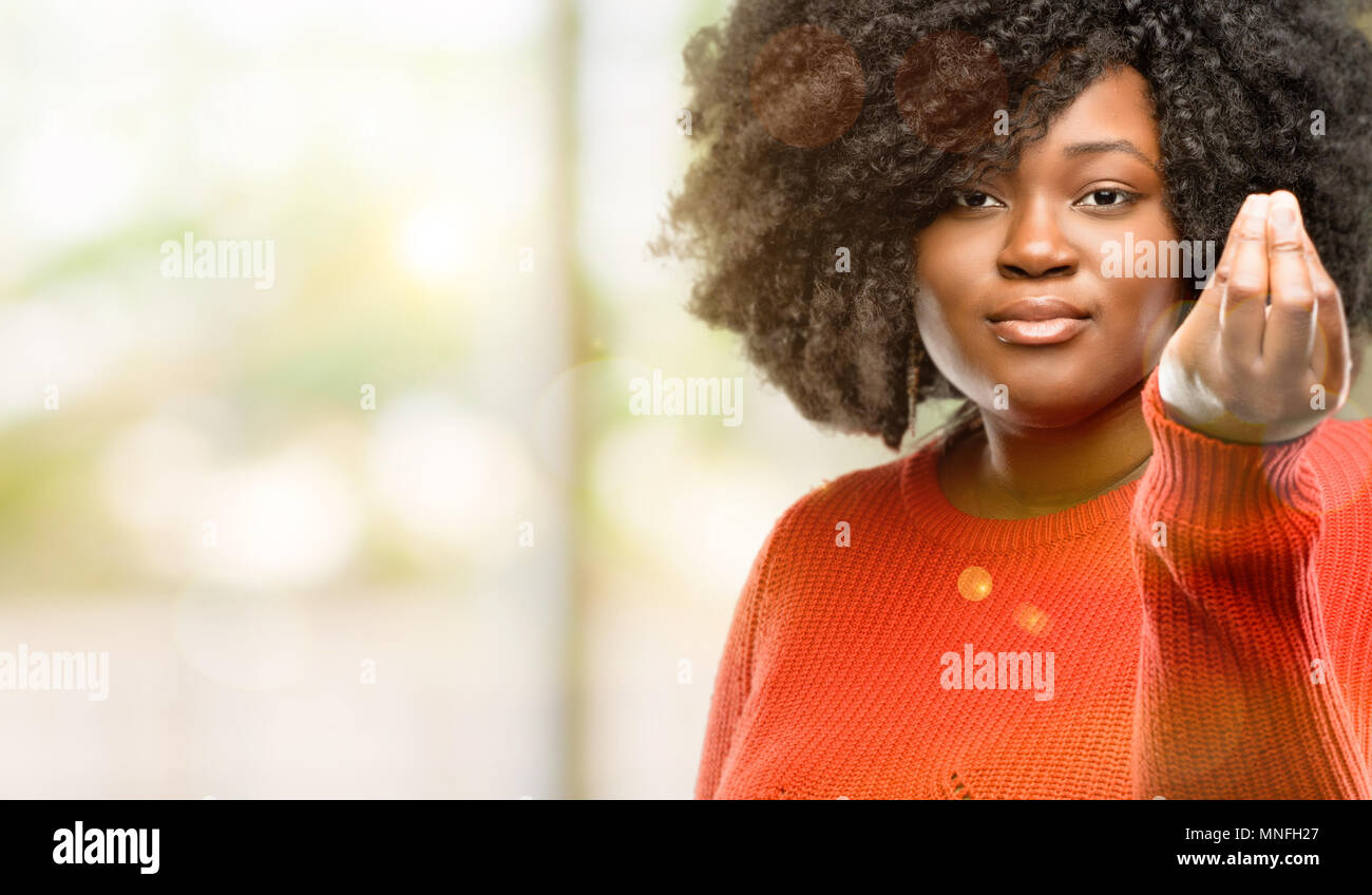 Beautiful african woman angry gesturing typical italian gesture with ...