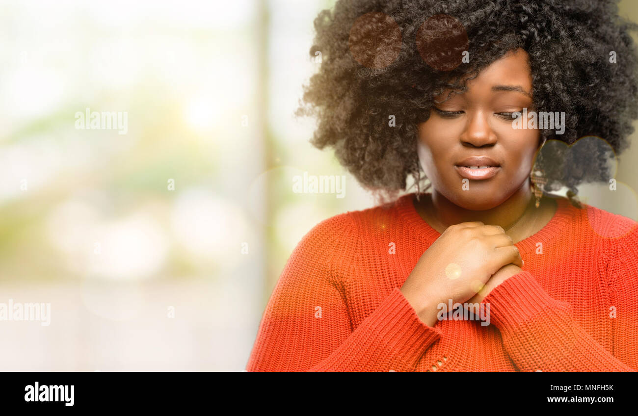 Beautiful african woman crying depressed full of sadness expressing sad ...
