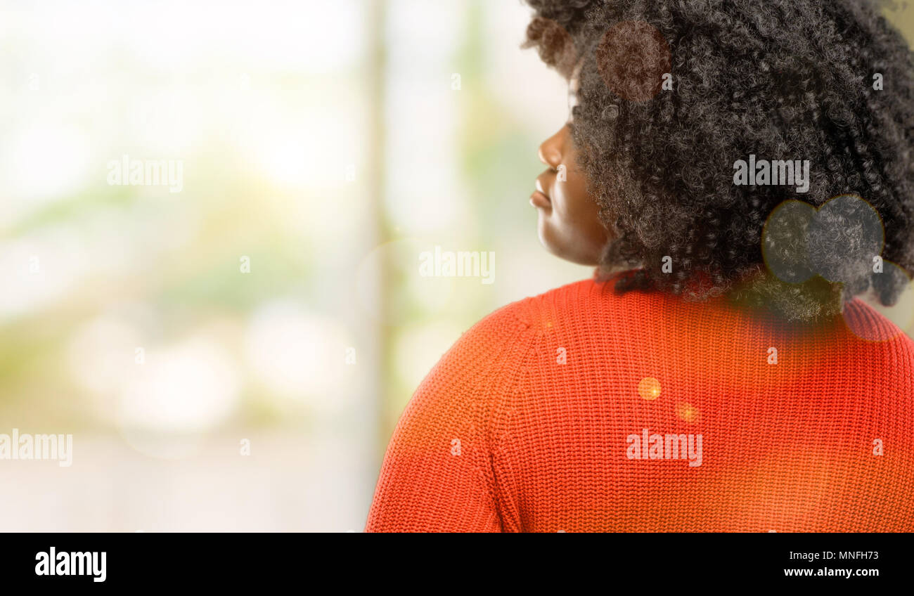 Beautiful african woman backside, rear view, outdoor Stock Photo - Alamy