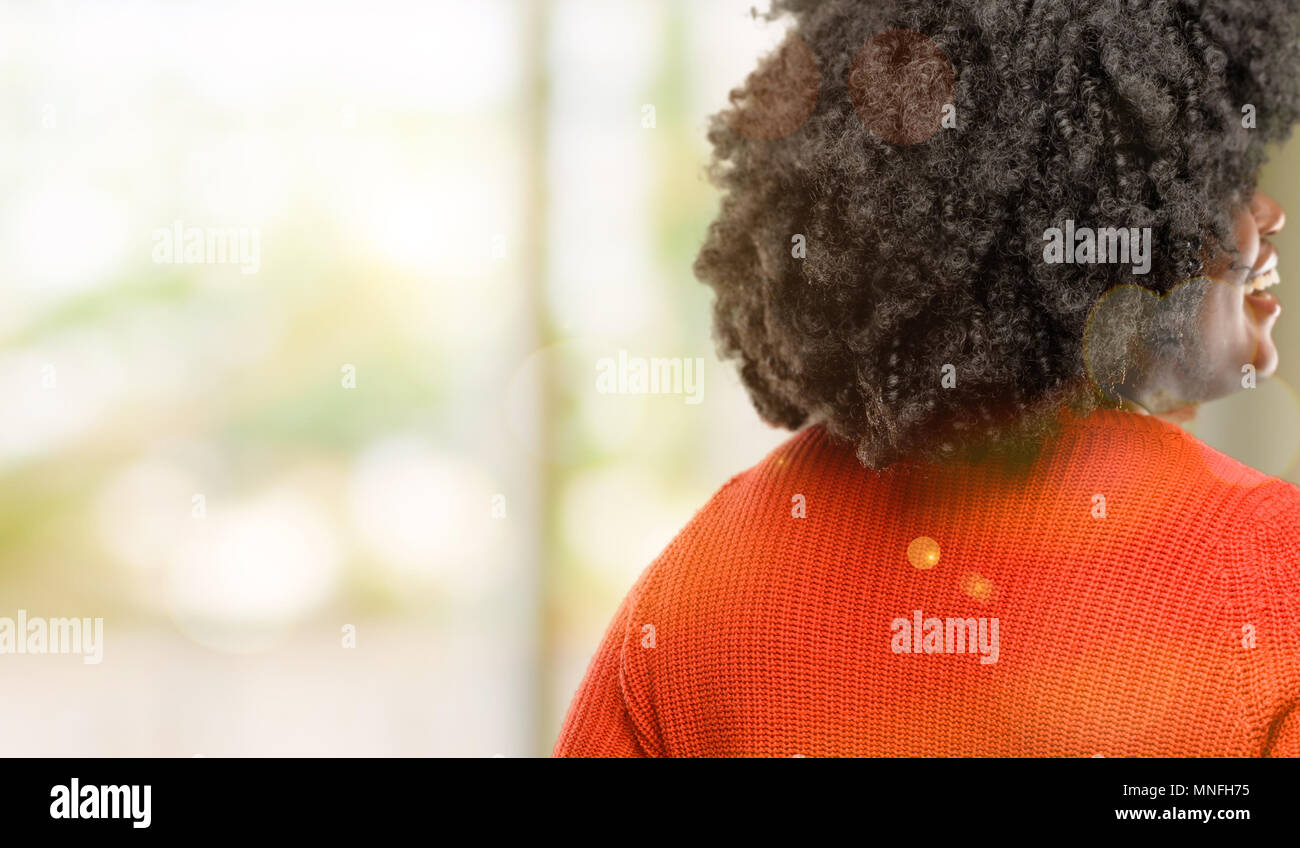 Beautiful african woman backside, rear view, outdoor Stock Photo - Alamy