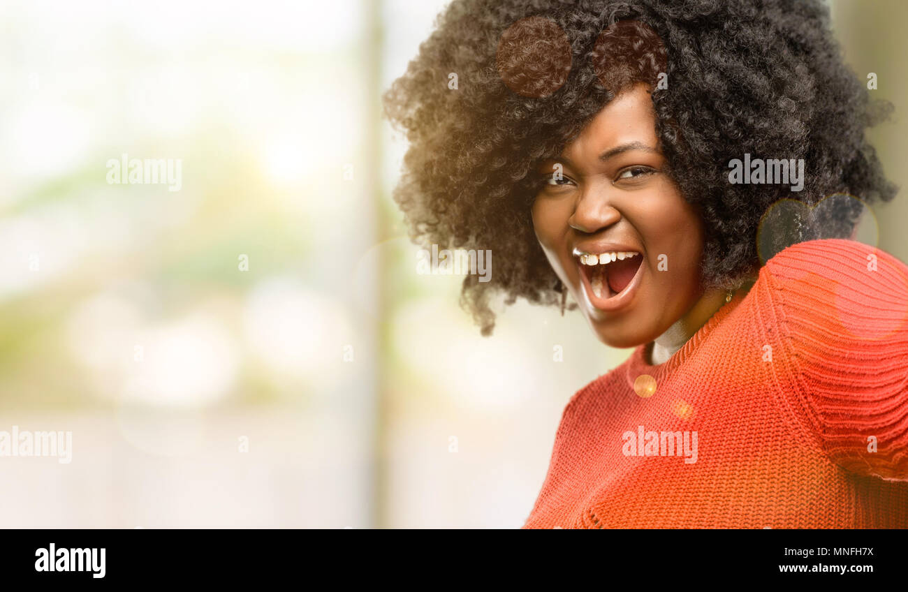 Beautiful african woman irritated and angry expressing negative emotion ...