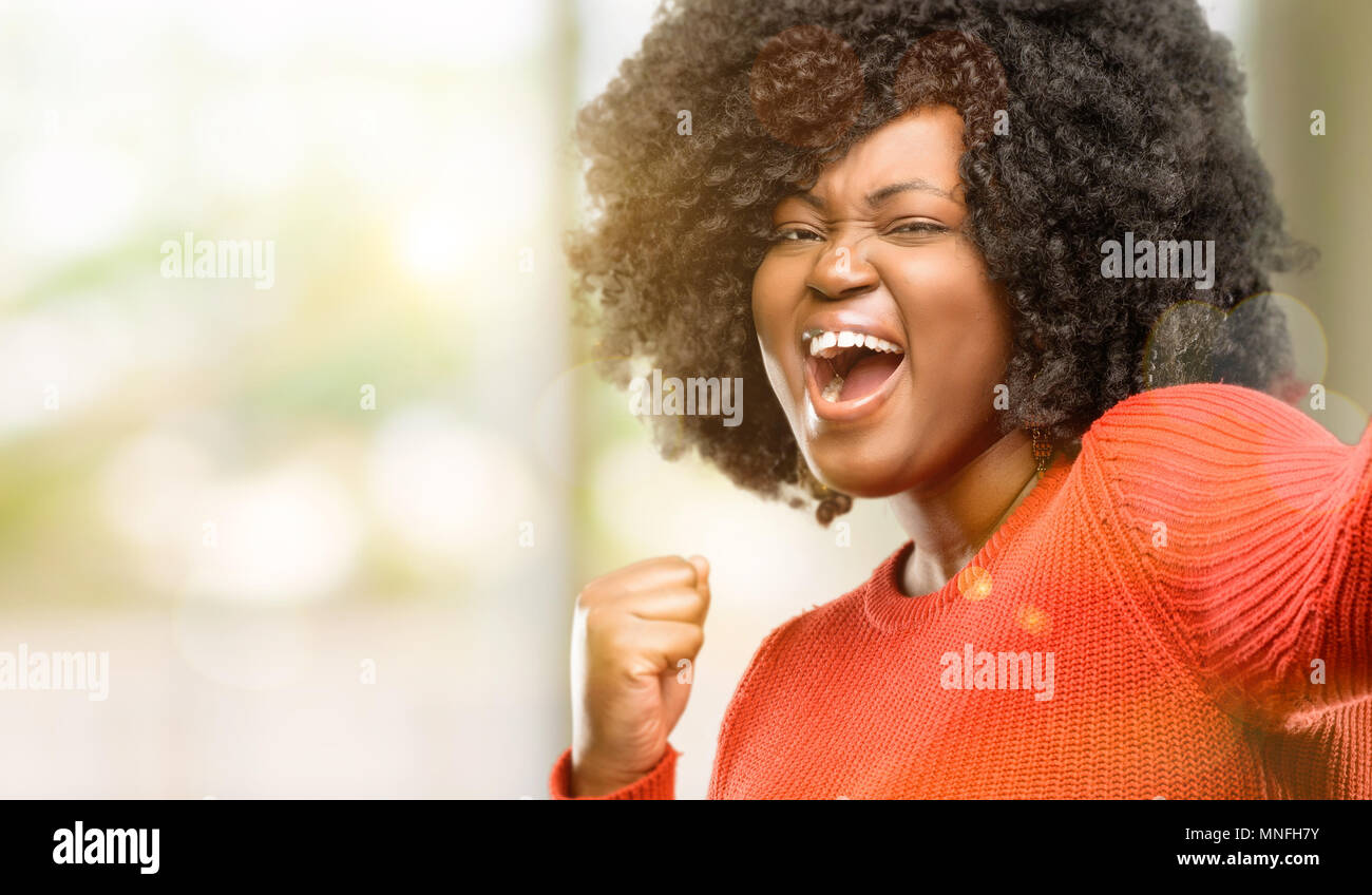 Beautiful african woman irritated and angry expressing negative emotion ...