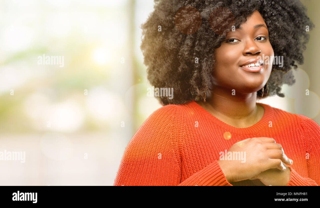 Beautiful african woman confident and happy with a big natural smile ...