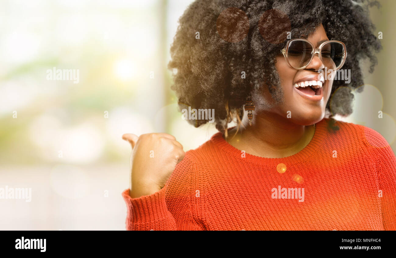 Beautiful african woman happy and excited celebrating victory ...
