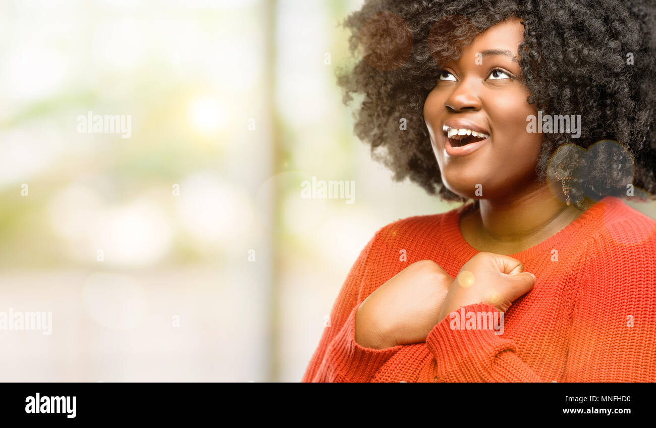 Beautiful african woman happy and excited celebrating victory ...