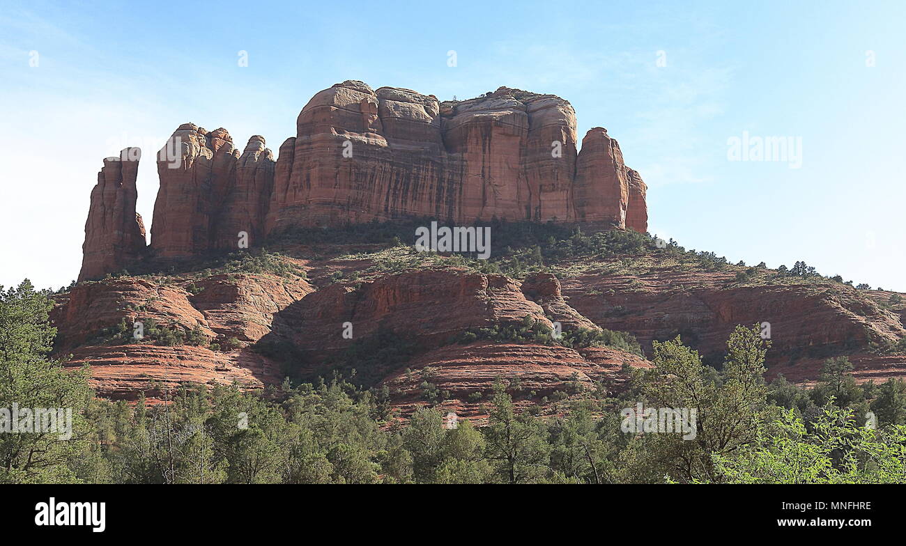 Cathedral Rocks rises over an amber field in Sedona, Arizona Stock ...