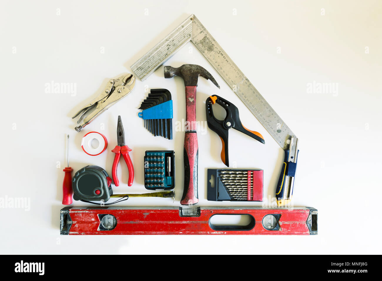 Home renovation concept. Shape of a house from construction tools Stock ...
