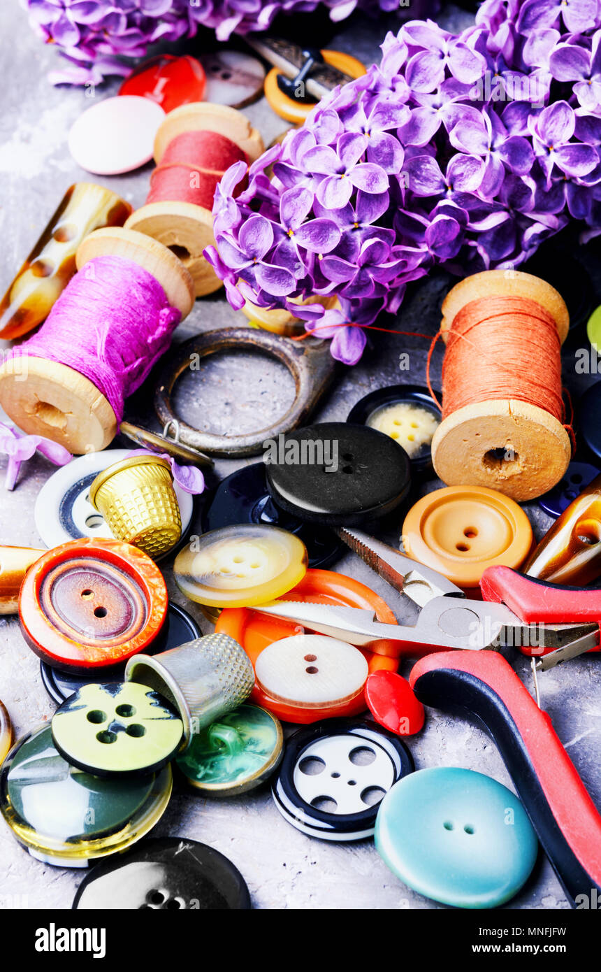 Collection of various sewing button,threads and scissors.Sewing ...