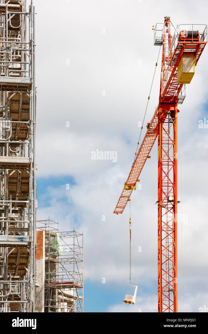 Building under construction. Crane machinery structure. Industry ...