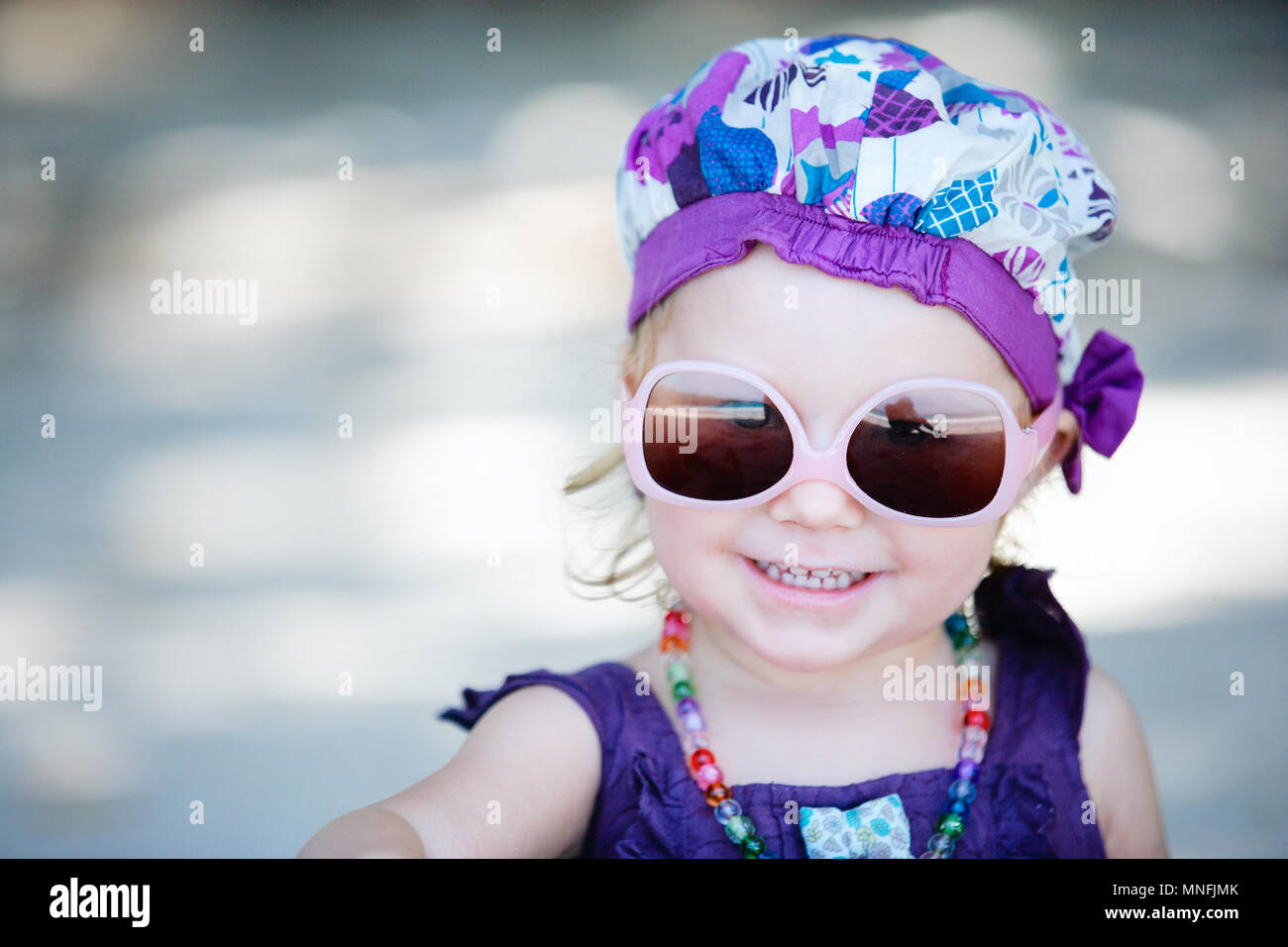Portrait of adorable toddler girl fancy dressed Stock Photo - Alamy