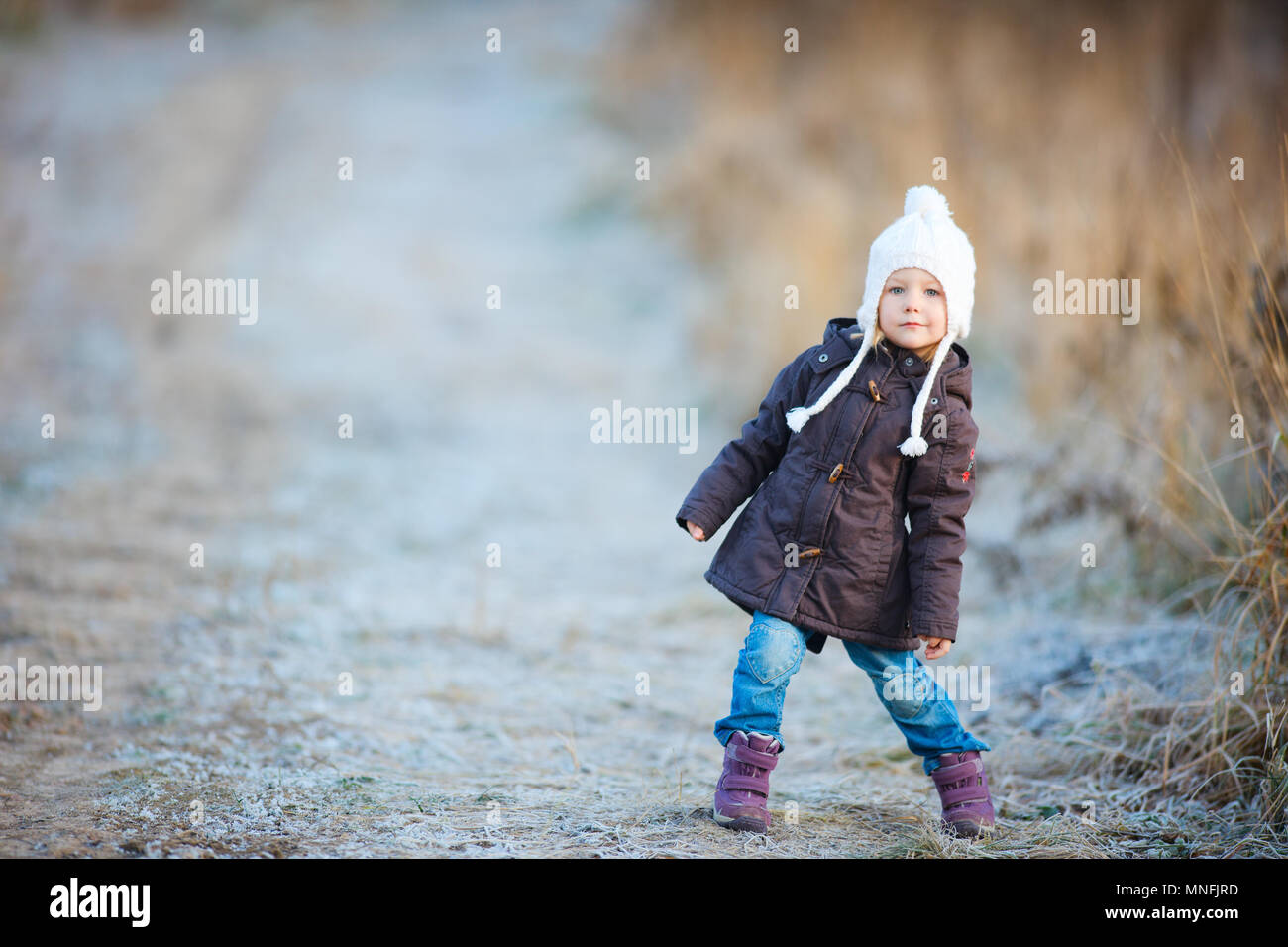 Portrait of adorable little girl outdoors on cold winter day Stock ...