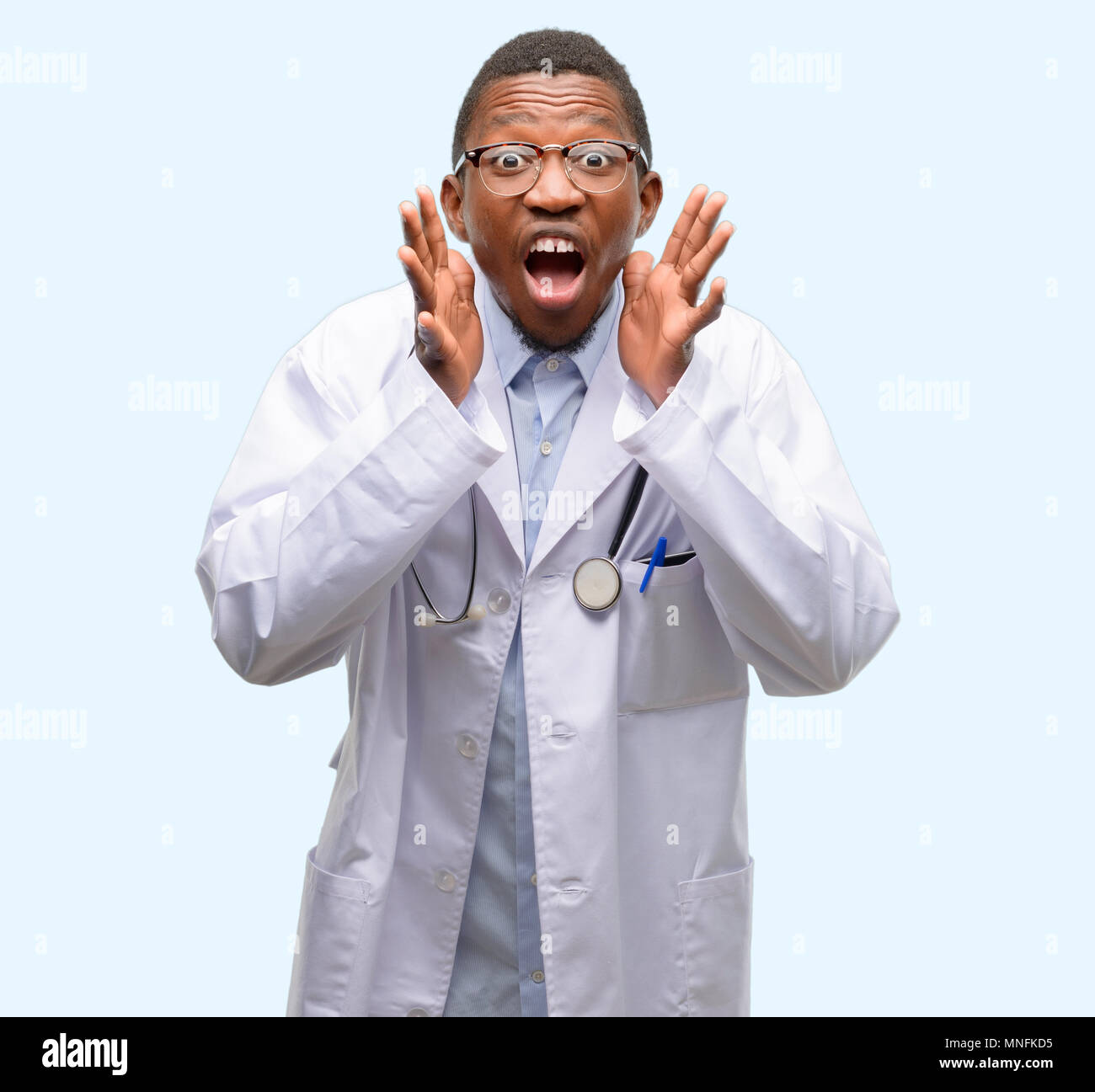 Young black doctor, medical professional stressful keeping hands on ...