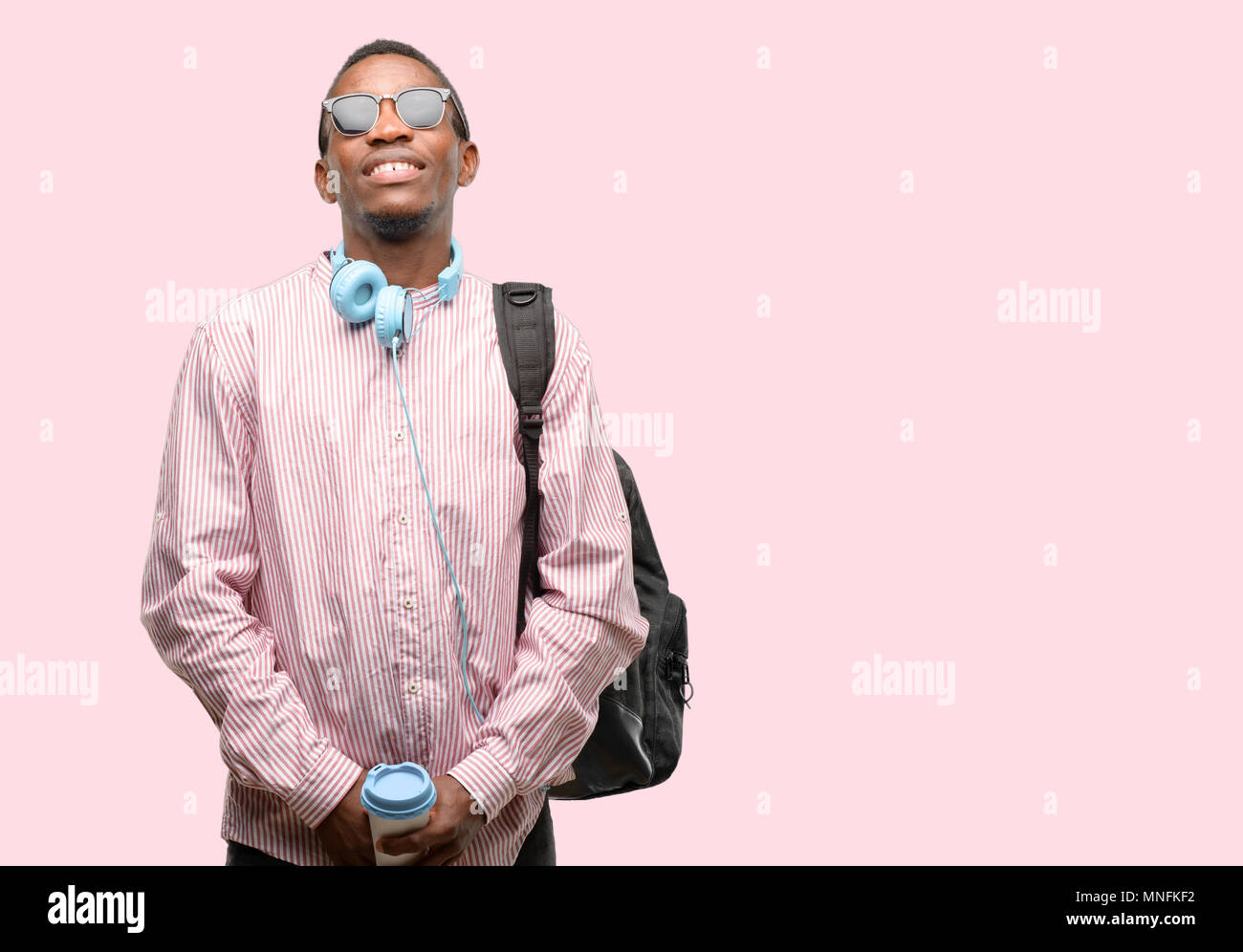 African black man student thinking and looking up expressing doubt and ...