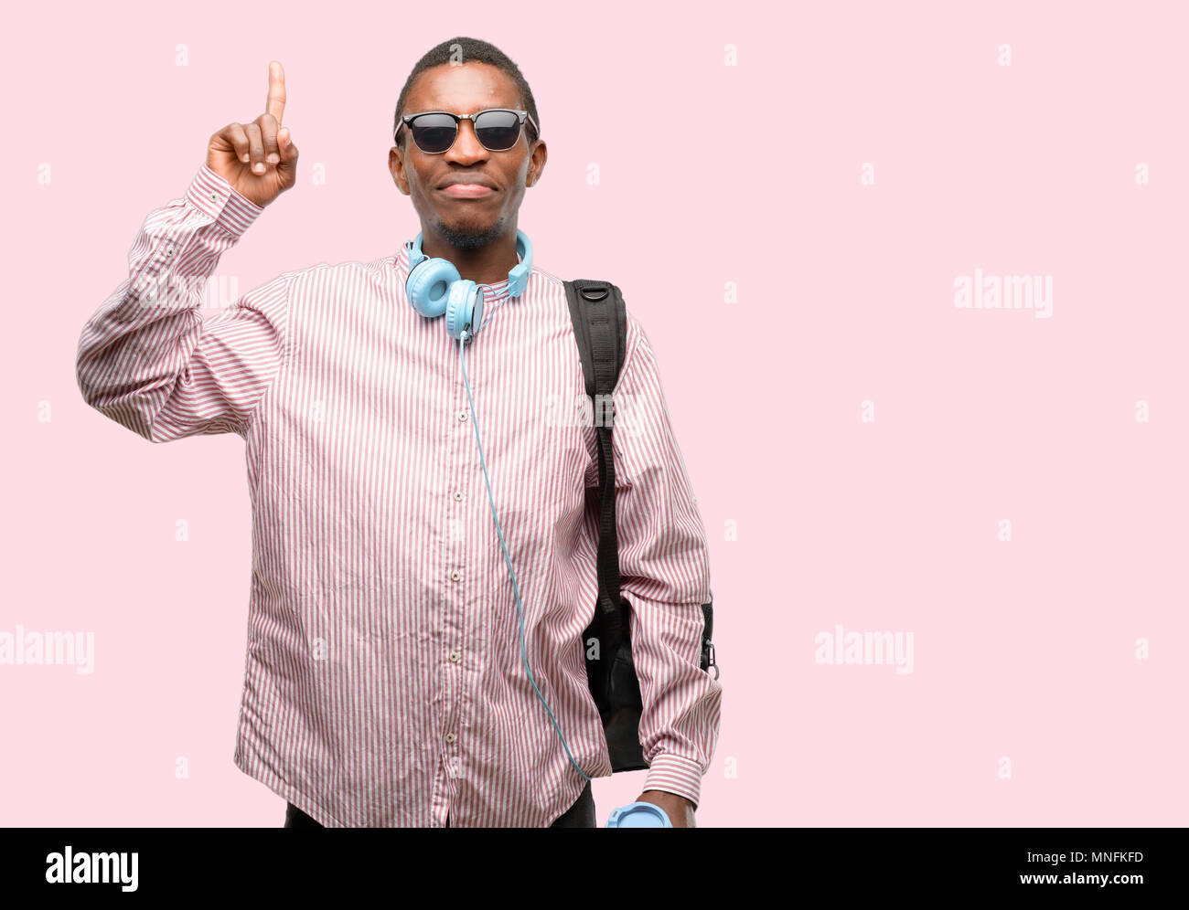 African black man student raising finger, the number one Stock Photo ...