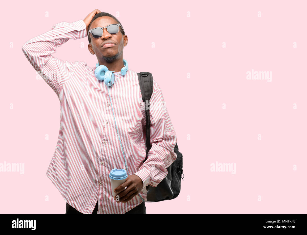 African black man student doubt expression, confuse and wonder concept ...