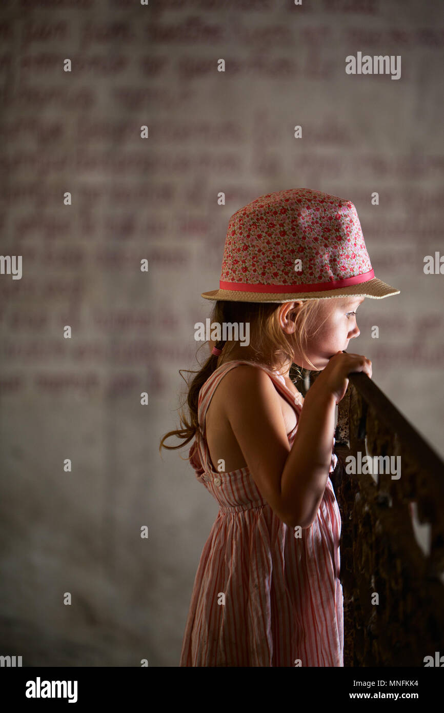 Portrait of adorable little girl outdoors looking at something Stock ...