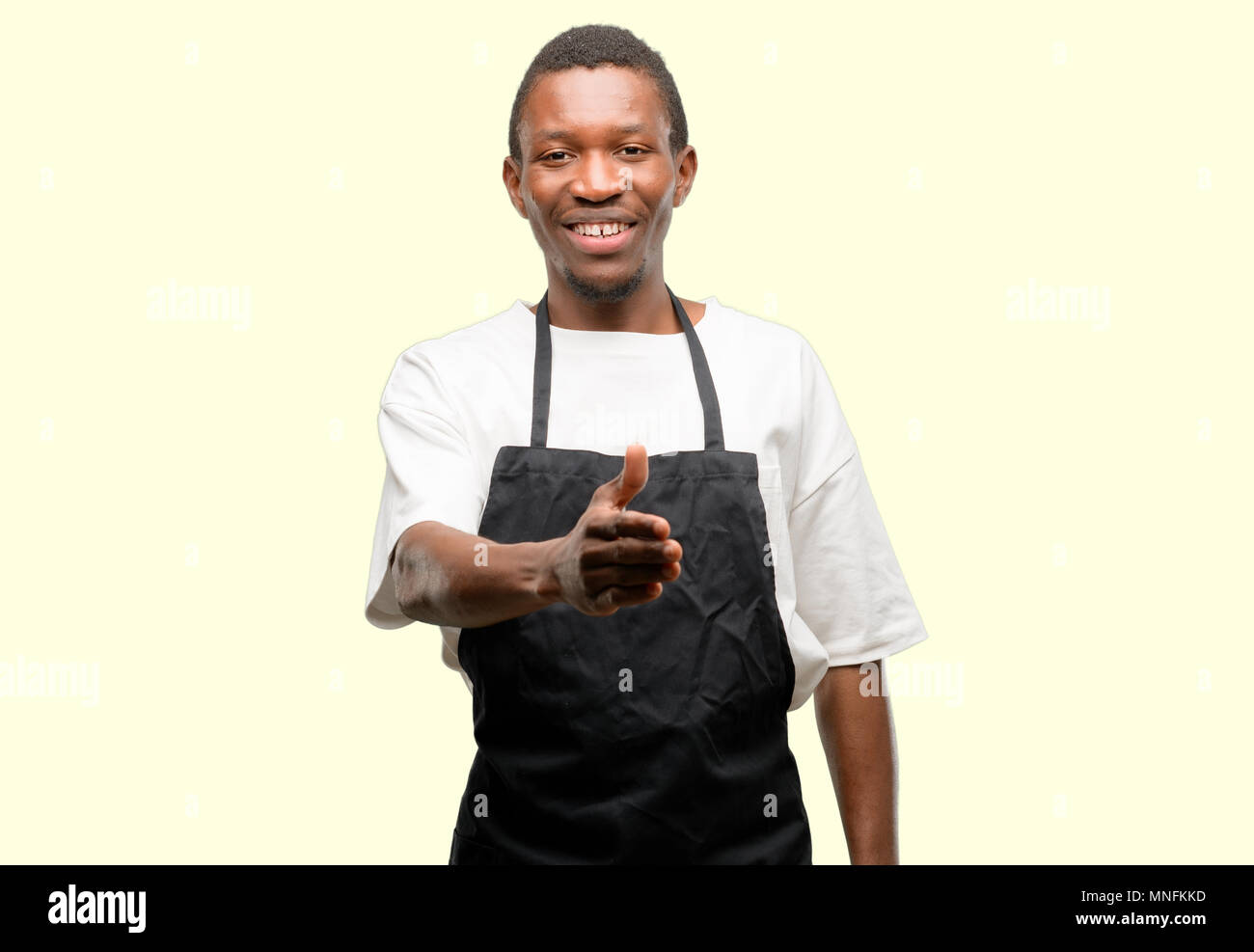 Hand shake shop owner hi-res stock photography and images - Alamy