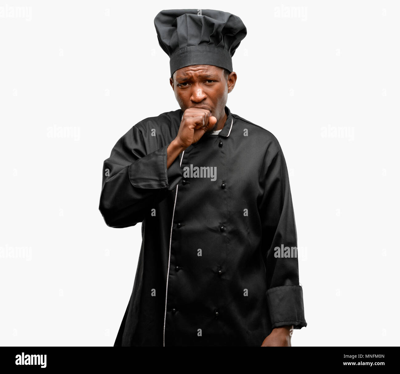 Young black cook wearing chef hat sick and coughing, suffering asthma ...
