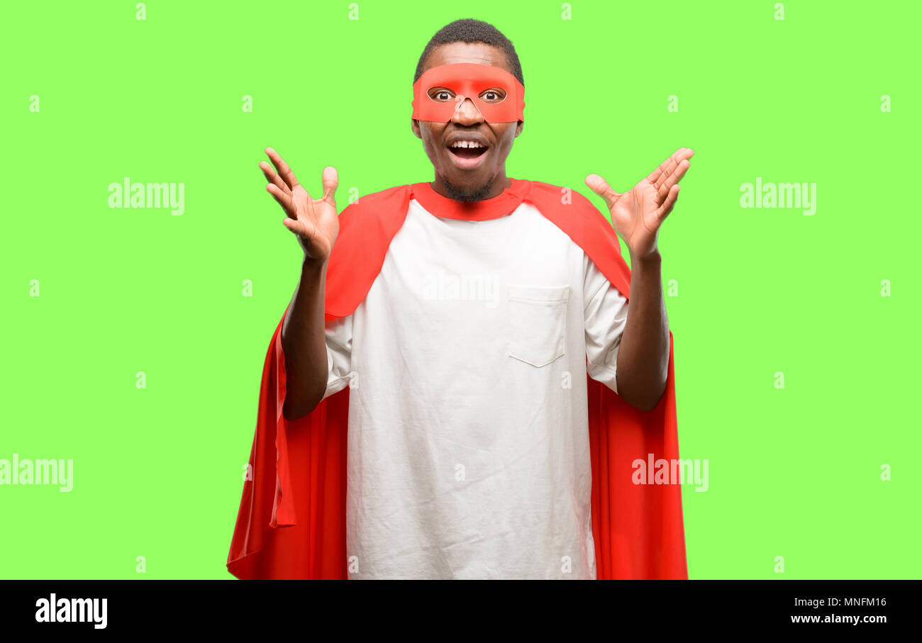 African black super hero man happy and surprised cheering expressing ...