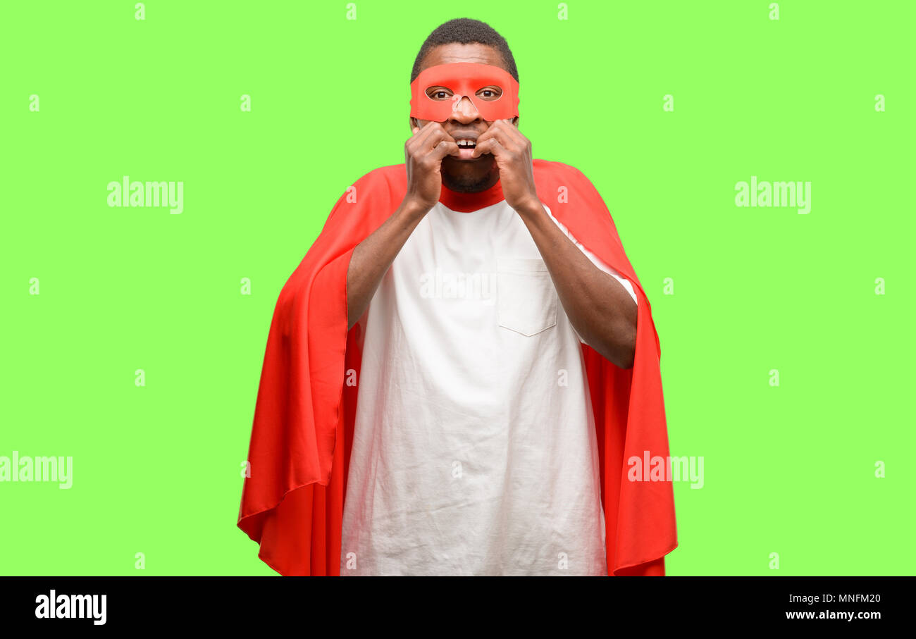 African black super hero man terrified and nervous expressing anxiety ...