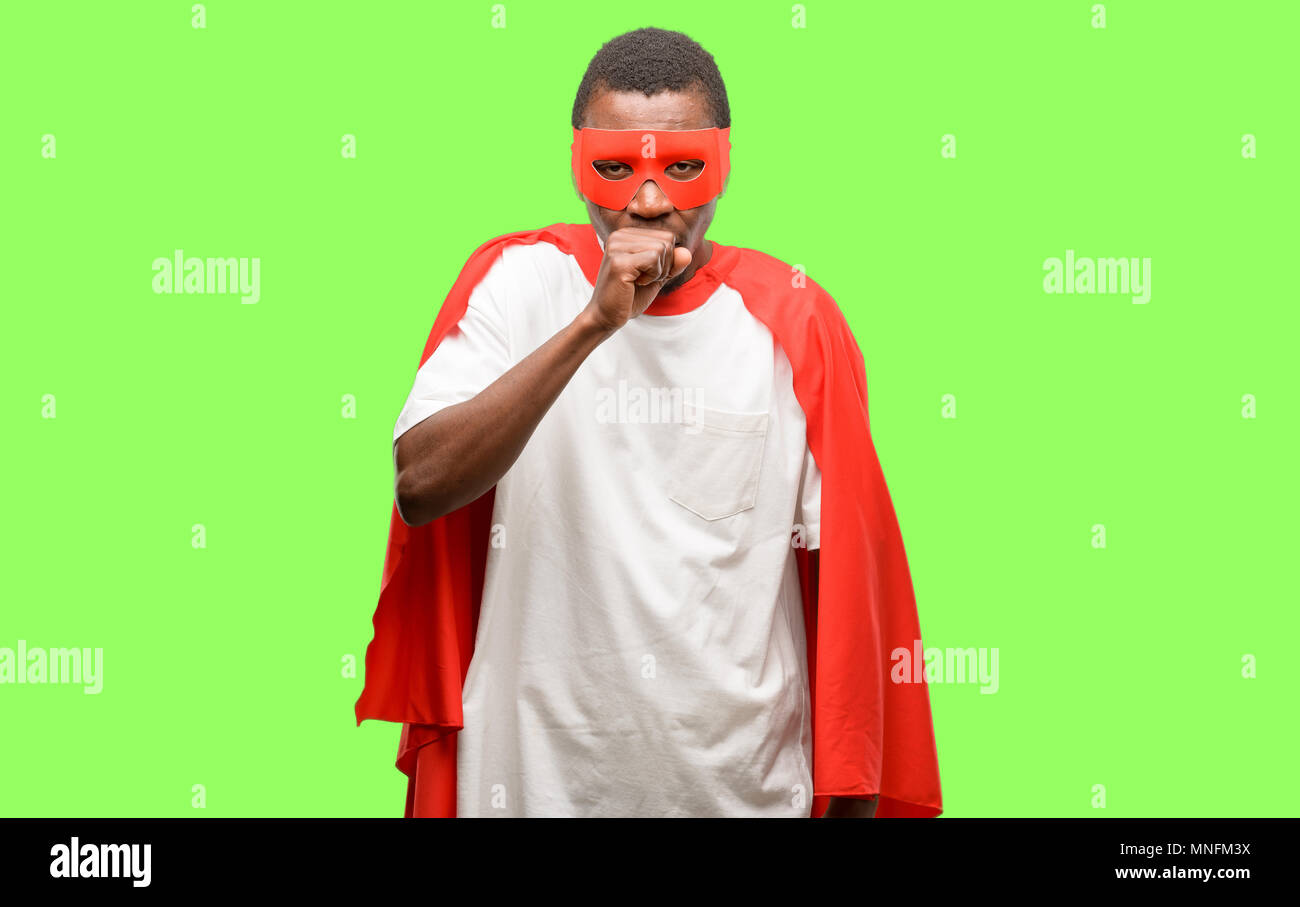 African black super hero man sick and coughing, suffering asthma or ...