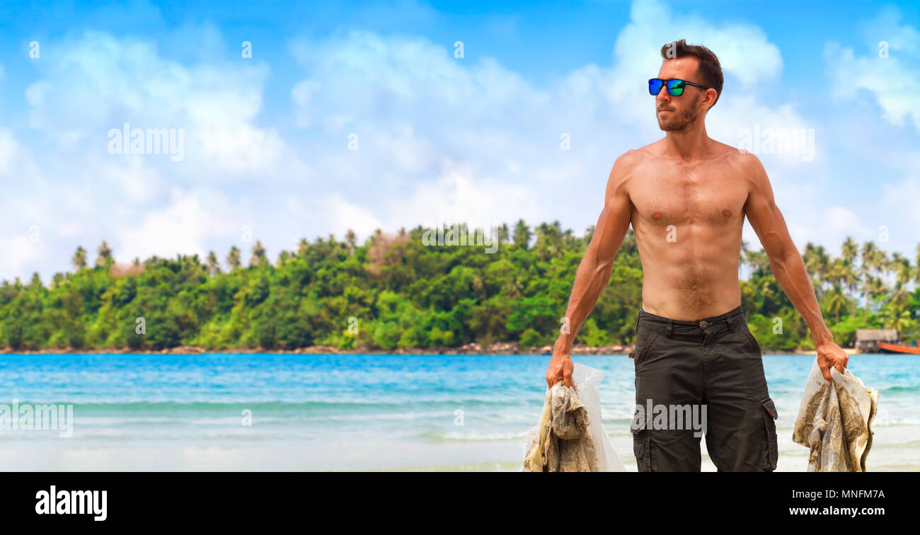 People clean beach on nature background Stock Photo - Alamy